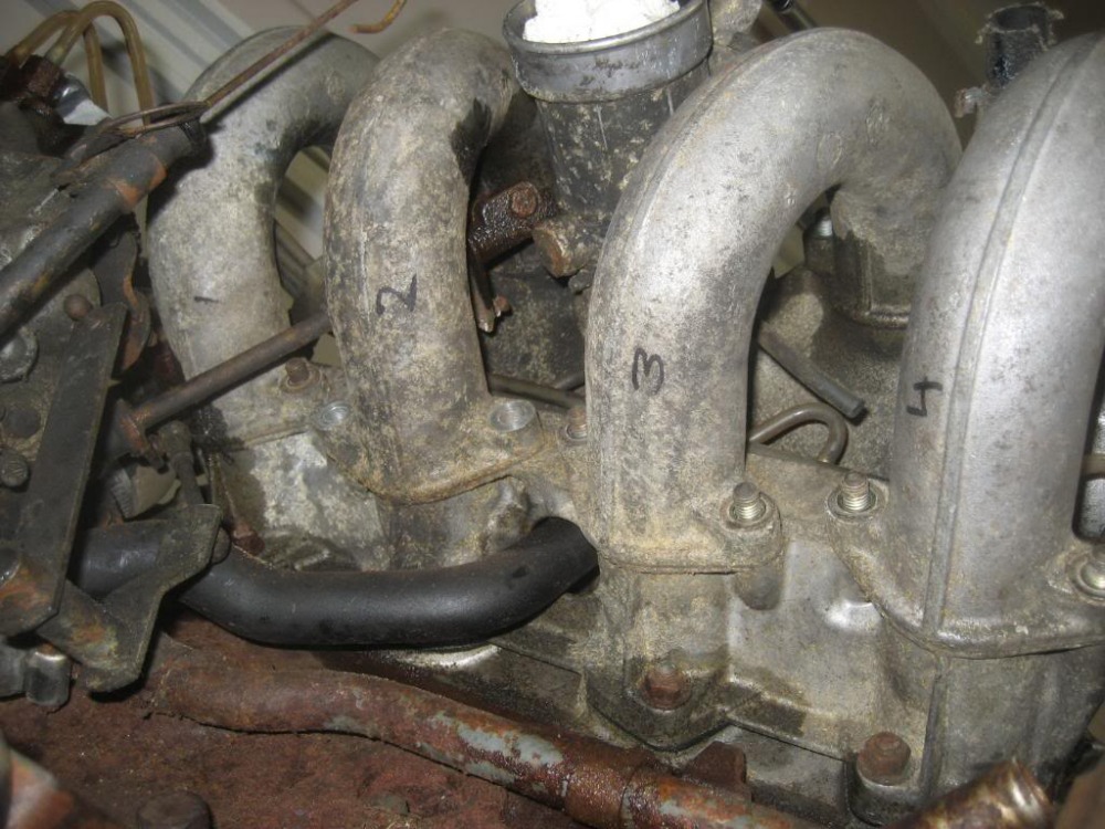 tii throttle body lever differences: parts book help |﻿ BMW 2002 and ...