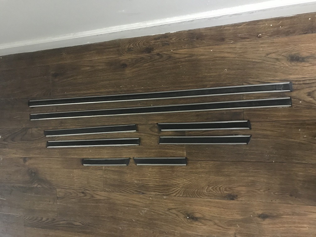 Complete Lower Door molding set, L+R floor kick panels, etc ...