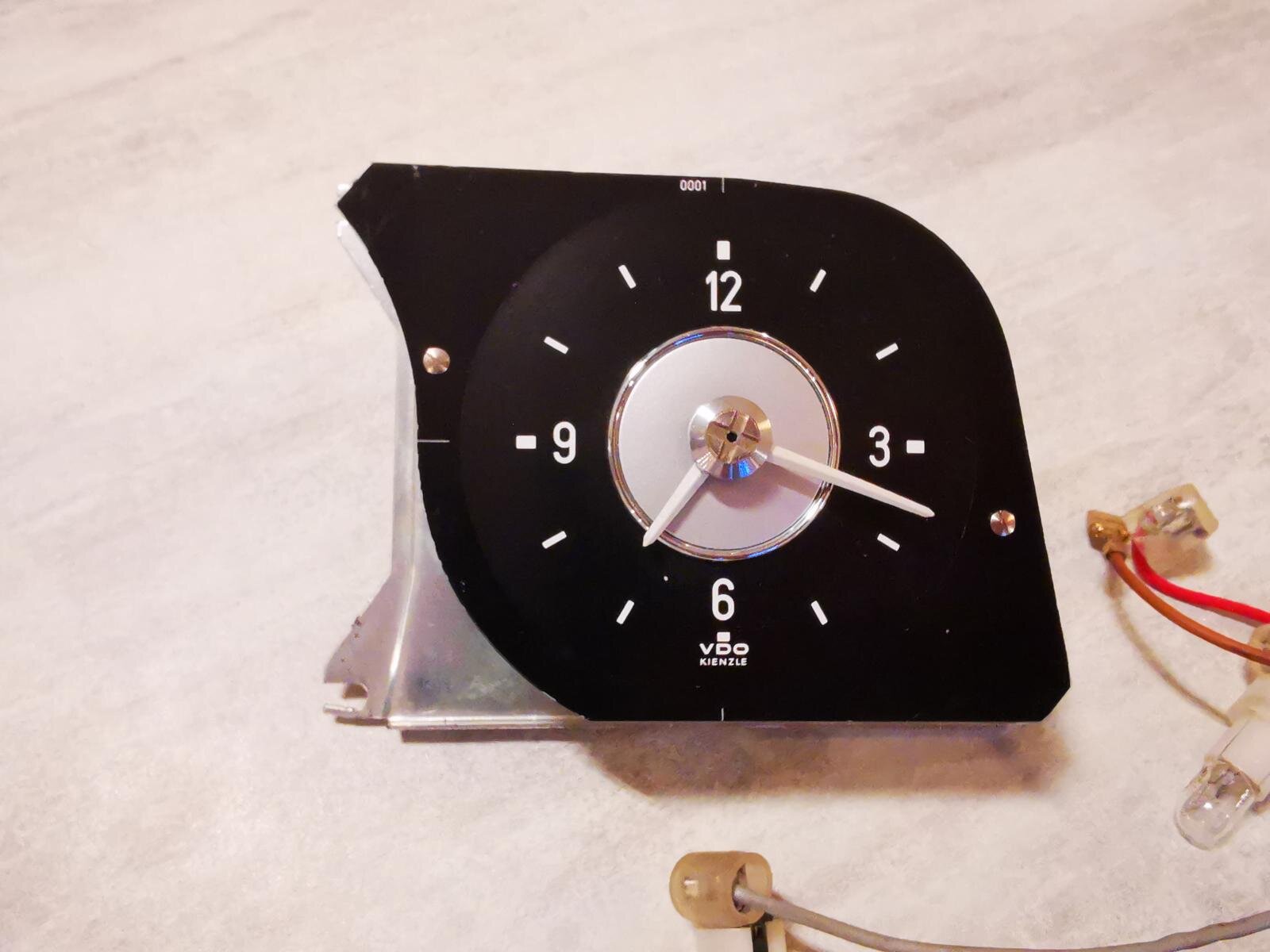 Nice early series silver dollar dash clock 12V mint cond ...