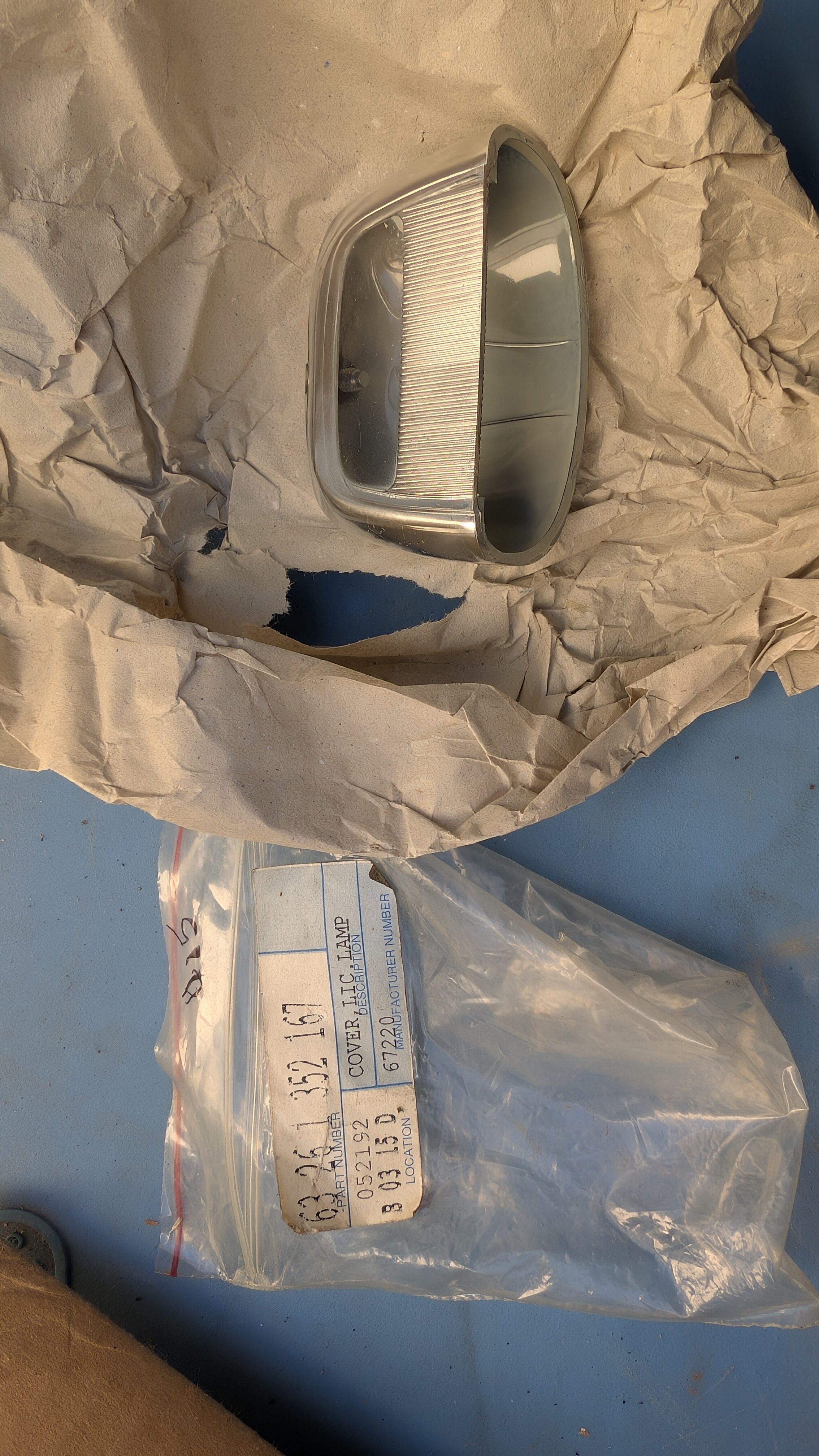 NOS hella license plate light cover - Body and Interior - 2002FAQ